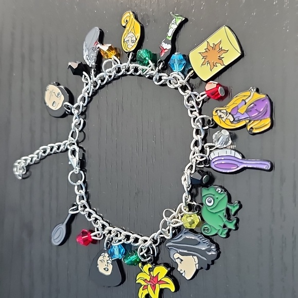 Disney | Jewelry | Disneys Tangled Inspired Charm Bracelet | Poshmark